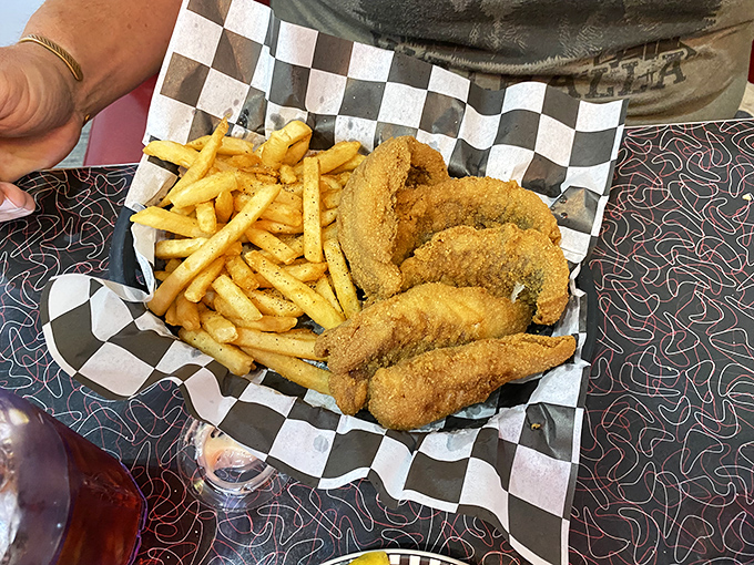 Golden-battered fish and perfectly crisp fries served on checkered paper&mdash;diner perfection that would make even coastal seafood snobs nod in reluctant approval.