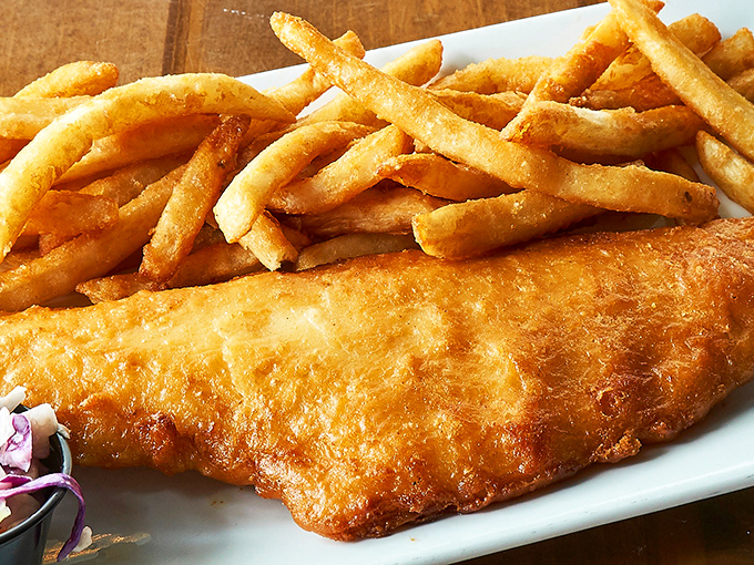 Golden, crispy fish and chips that would make a British pub-goer weep with joy. The perfect batter-to-fish ratio is no accident.