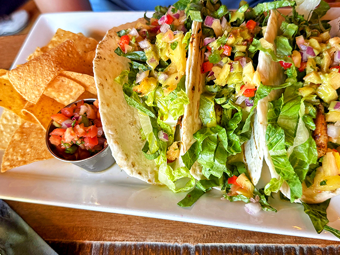 These aren't just fish tacos; they're edible masterpieces that make you wonder why you ever settled for drive-thru Mexican. The fresh salsa? Just the cherry on top.