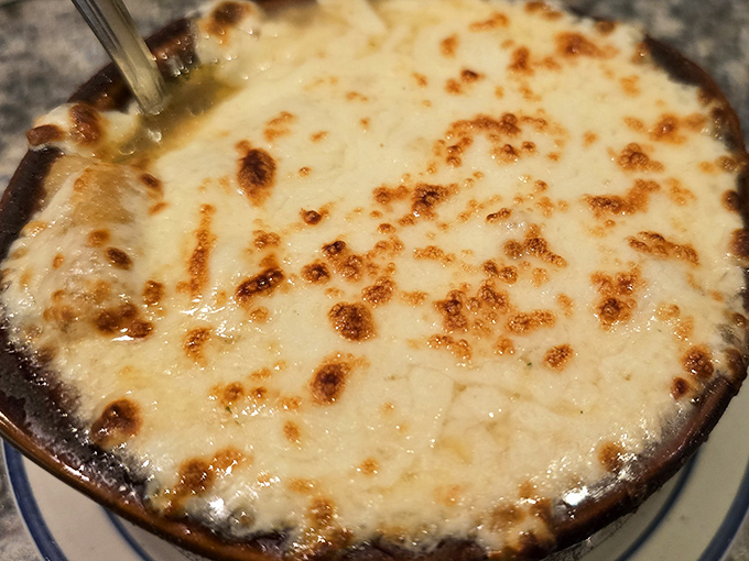 French onion soup that's achieved the perfect cheese-pull-to-broth ratio &ndash; a bubbling cauldron of comfort that's worth the inevitable chin dribble.