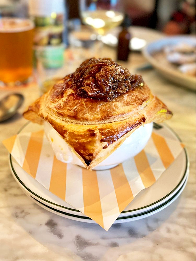 This isn't just French onion soup&mdash;it's a masterpiece of melted cheese, caramelized onions, and crusty bread. The kind of dish that makes you want to propose marriage to your server.