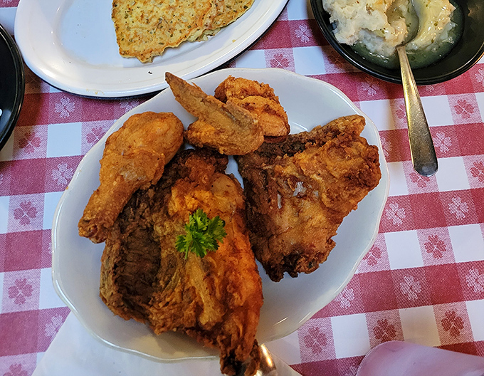 Golden-brown perfection that makes Colonel Sanders look like an amateur. This isn't just fried chicken&mdash;it's a masterclass in crunch-to-juiciness ratio.