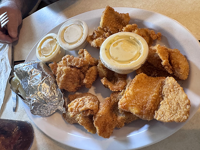 Golden-brown fried chicken that makes a mockery of every chain restaurant's attempt at the dish. That audible crunch is the sound of culinary perfection.