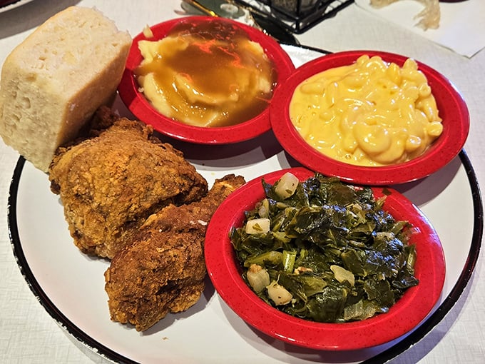 Golden-fried chicken that crackles with each bite, nestled alongside mac and cheese that could make your grandmother question her recipe.
