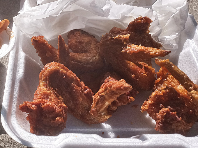 These aren't just wings; they're crispy little flavor bombs that make you wonder why you ever bothered with those chain restaurant imposters.
