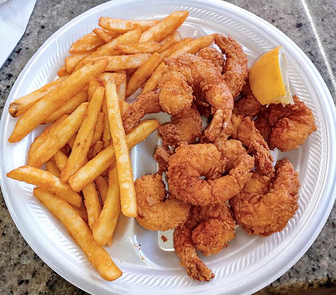 Golden perfection meets crispy satisfaction in this plate that defines comfort food at its finest.