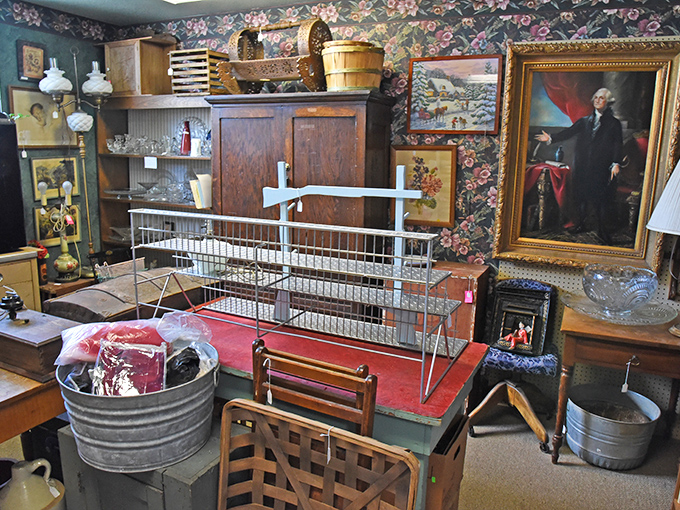 George Washington keeps watchful eye over this eclectic booth where farmhouse finds mingle with elegant portraiture in delightful contradiction.