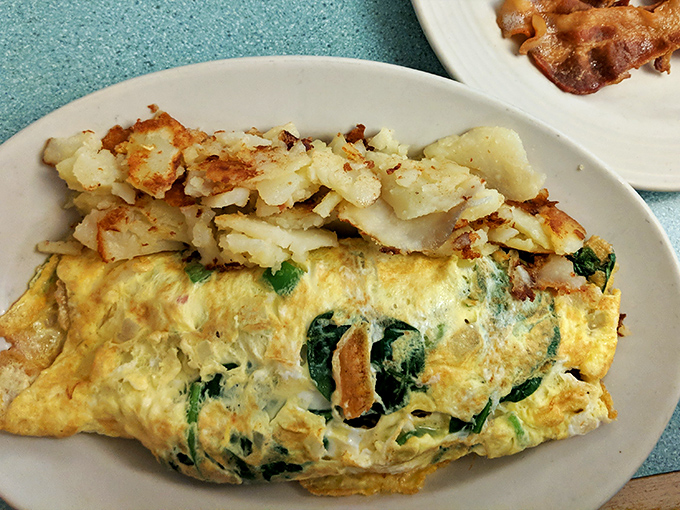 This Greek omelet doesn't just whisper "good morning" – it belts out "KALIMERA!" with spinach and feta in perfect harmony.