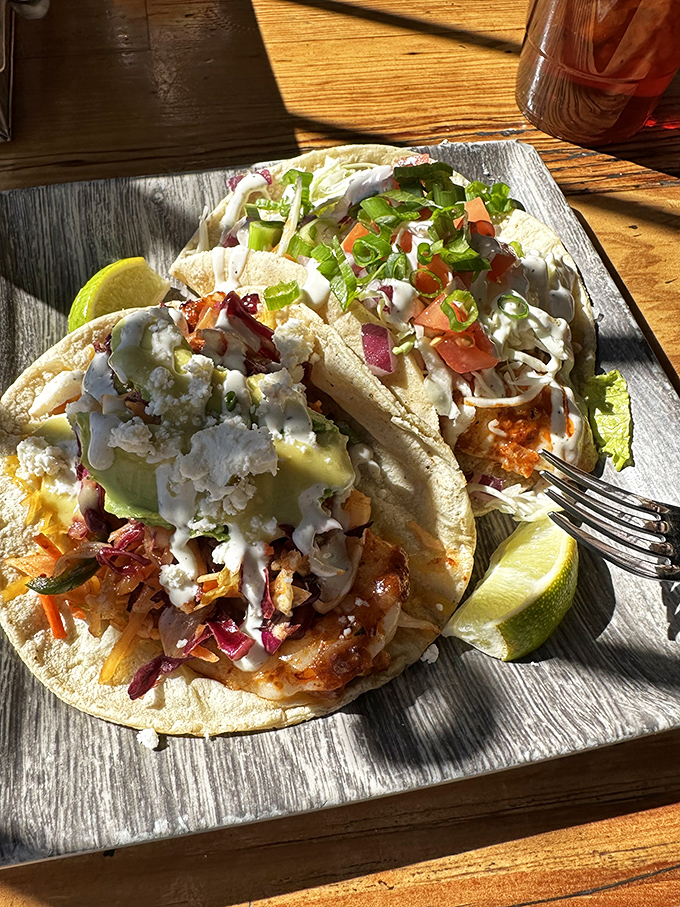 These aren't just fish tacos&mdash;they're edible postcards from seafood heaven. Fresh cabbage crunch, creamy sauce, and fish so tender it practically swam onto your plate.