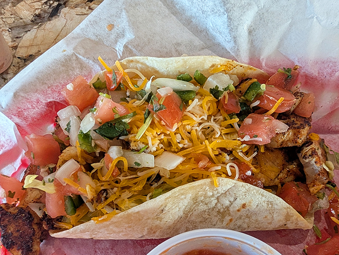 Behold the star attraction: grouper tacos loaded with fresh pico and cheese. Like Florida sunshine wrapped in a tortilla.