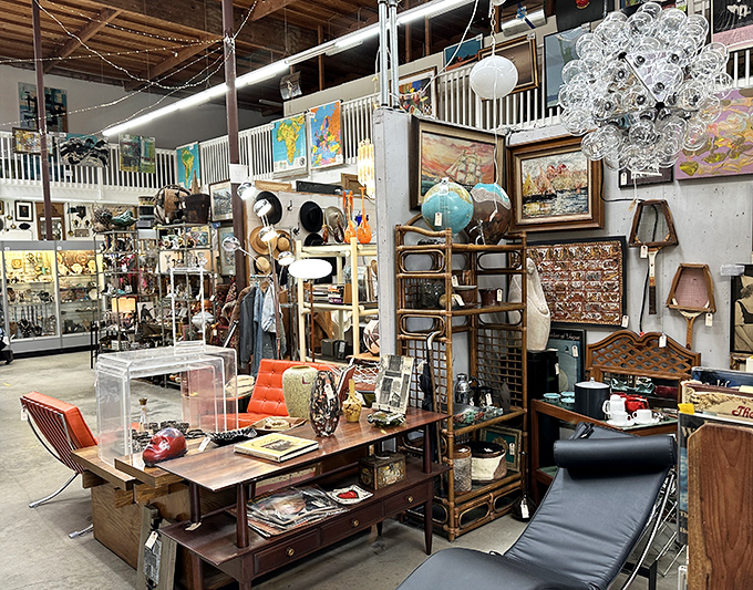 Mid-century modern meets industrial chic in this corner where every item seems to be whispering, "Take me home, I have stories to tell.