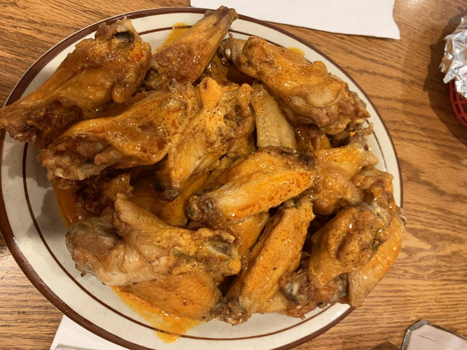 Wings that don't need a sporting event excuse. These golden-hued beauties pack enough flavor to make you temporarily forget your table manners.