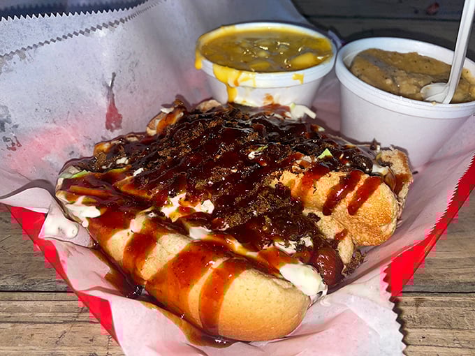 This isn't just a sandwich&mdash;it's a masterpiece of pulled pork, sauce, and slaw that might just make you forget your table manners entirely.