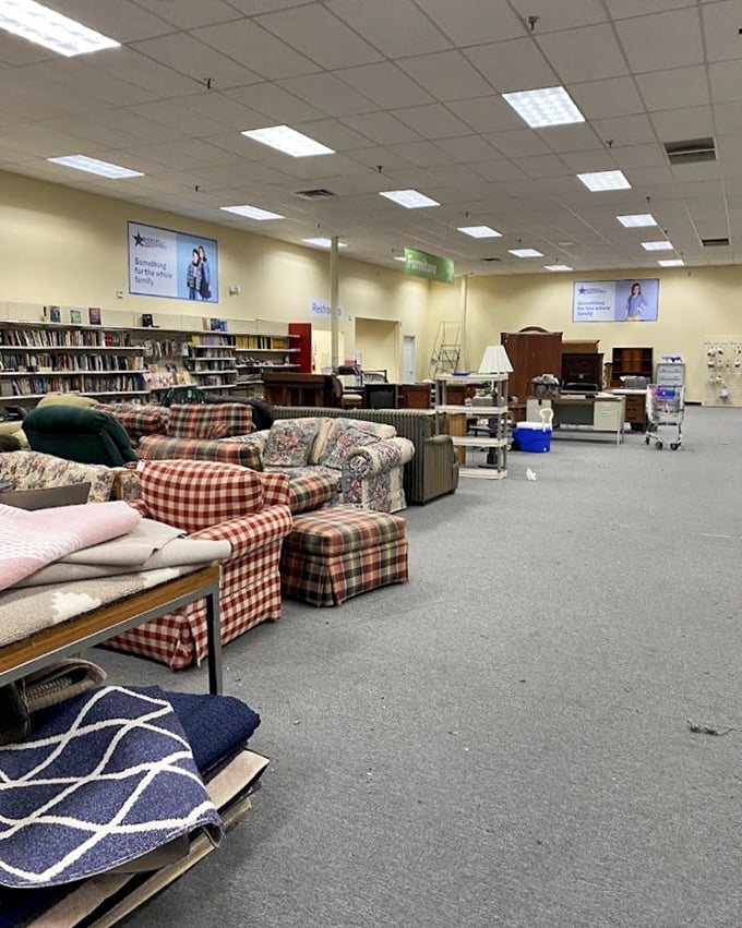 Furniture that tells stories sits patiently waiting for its next chapter. That plaid couch has seen things, my friends.