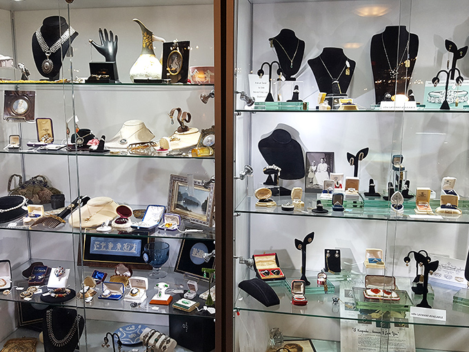 Tiny universes of history sparkle behind glass. Each jewelry case contains someone's past celebrations, now waiting for your future special occasions.