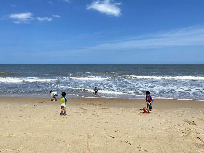 Childhood memories in the making. These little beachcombers are discovering that nature's playground beats any video game.