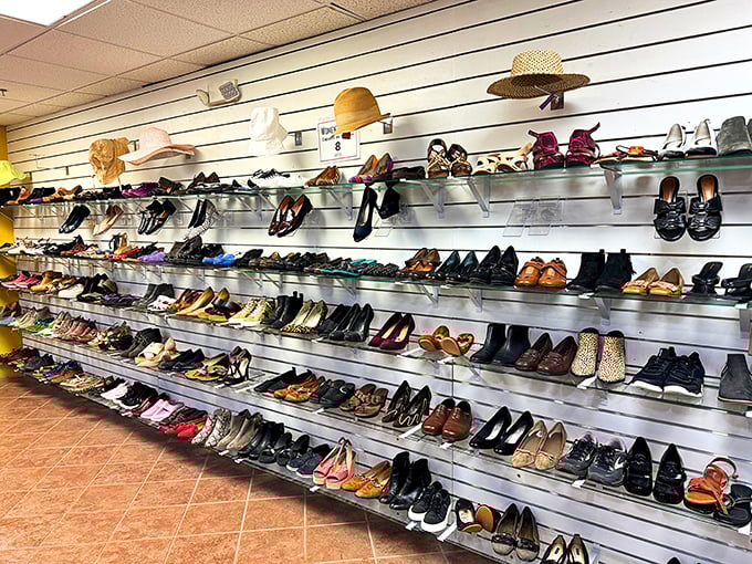 Shoe heaven exists! Rows upon rows of footwear waiting for their Cinderella moment, proving one person's castoffs become another's perfect fit.