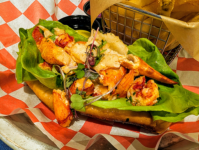 This isn't just a lobster roll&mdash;it's edible poetry. Succulent chunks of lobster nestled in a perfectly toasted bun with fresh greens playing supporting roles.