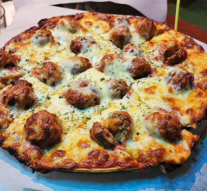Meatball pizza that makes you question all other pizza choices in your life. Those perfectly seasoned spheres of joy demand your full attention.