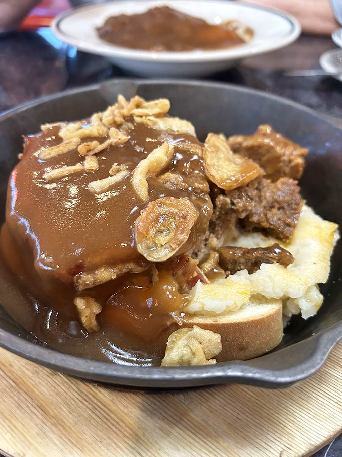 Behold the hot roast beef sandwich&mdash;where bread becomes a throne for tender meat, crowned with gravy that's clearly been simmering since breakfast.