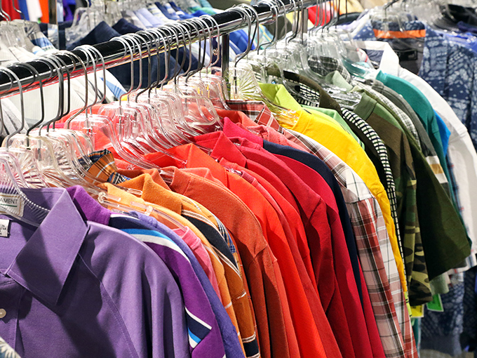 A rainbow of possibilities hangs in perfect order &ndash; each shirt representing both sustainable fashion and the chance to reinvent your style for pocket change.