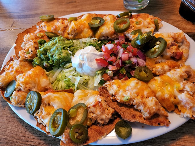 These aren't your ordinary nachos—they're a runway of flavors with melted cheese, jalapeños, and all the fixings creating a perfect landing pad for your appetite.