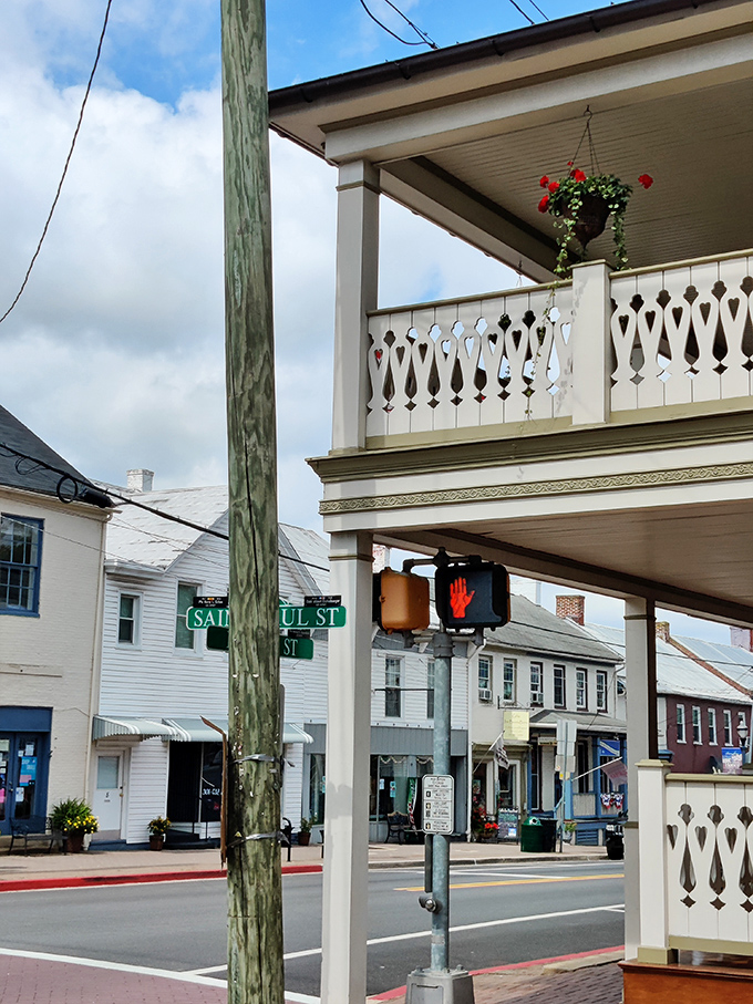 Ornate porch railings and hanging flower baskets&mdash;Boonsboro's version of a welcome mat extends right to the sidewalk.