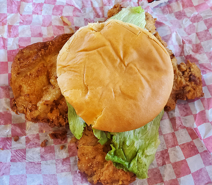 The breaded tenderloin&mdash;Indiana's unofficial state sandwich&mdash;spills gloriously beyond its bun boundaries in a delicious act of midwestern defiance.