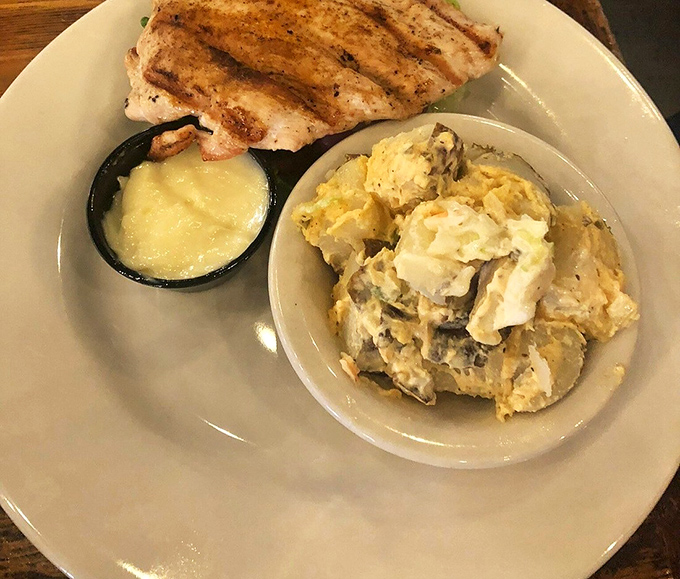 That potato salad isn't just a side dish; it's the supporting actor who steals the show. Creamy, mustard-forward perfection that makes grilled chicken feel like the opening act.