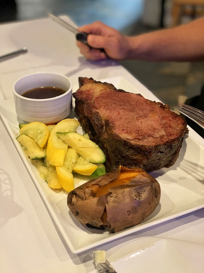 The star of the show: prime rib so perfectly cooked it practically whispers "I'm worth the journey" with every succulent bite.
