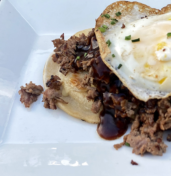 Breakfast gets the barbecue treatment with pulled pork and a perfectly fried egg. This plate doesn't just break fast&mdash;it shatters expectations.