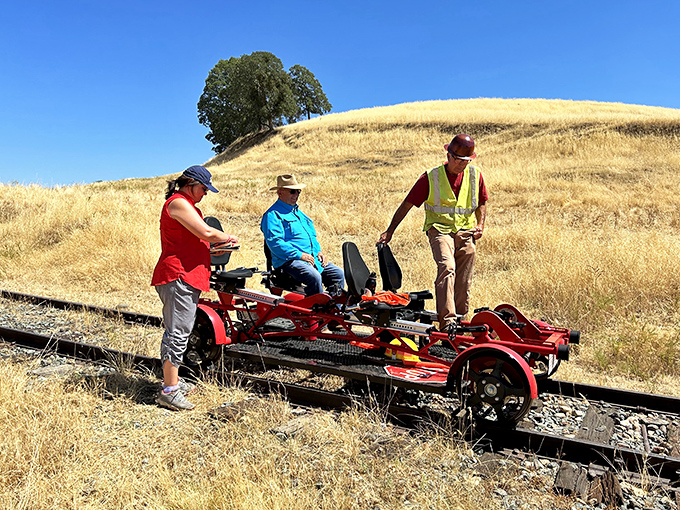 All aboard the railbike adventure! Pedaling along historic tracks offers views of golden California hills no car window could ever frame.