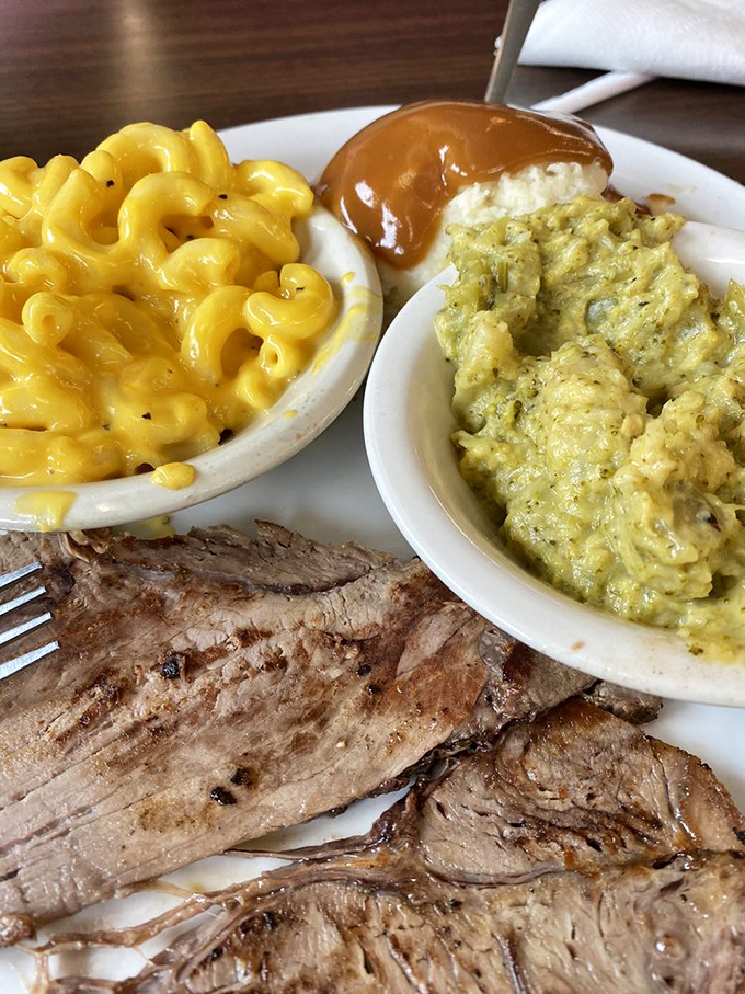 Meat and three heaven! This plate showcases Clyde's commitment to the art of perfectly executed comfort food&mdash;mac and cheese so yellow it could direct traffic. 