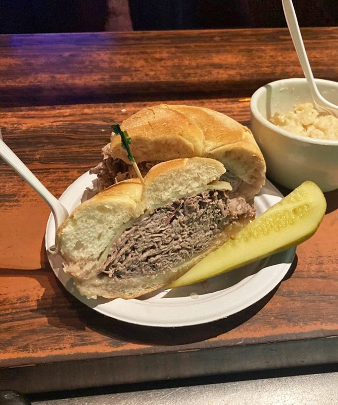 The legendary roast beef sandwich in its natural habitat—thick-cut, perfectly pink, and ready to make you forget cheesesteaks exist.