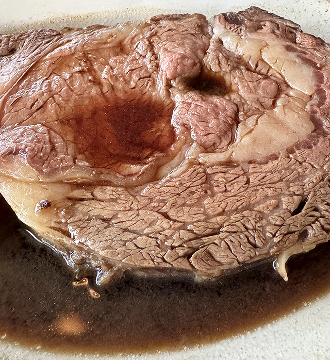 This isn't just roast beef&mdash;it's a masterclass in meat. Tender, juicy, and swimming in its own savory juices like it's enjoying a Florida vacation.