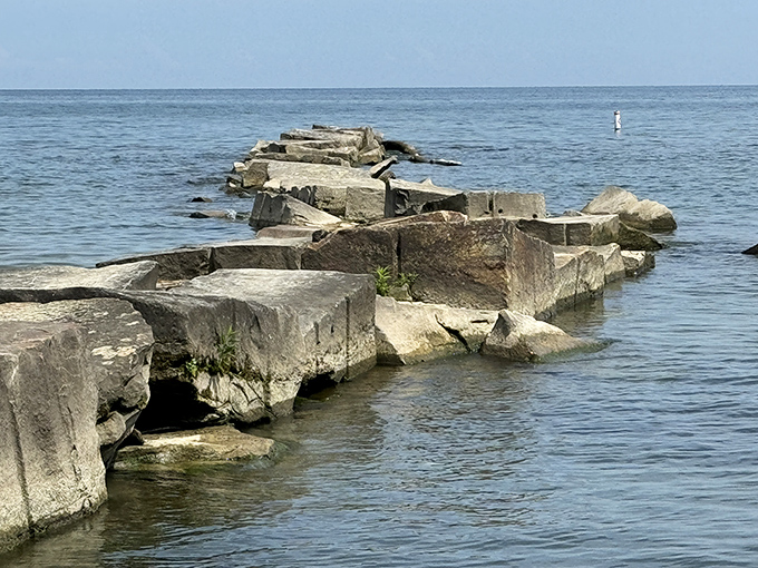 Massive stone blocks form a path into the lake, like a giant's game of hopscotch. Just remember what the sign says&mdash;admire, don't climb!