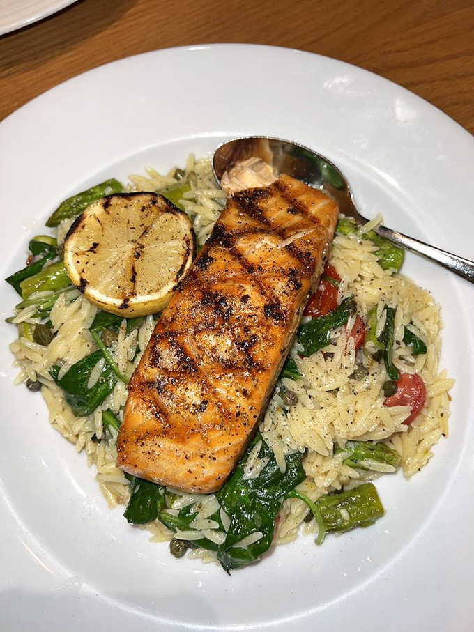 This salmon isn't just cooked, it's been persuaded to perfection. Flaky fish rests on a bed of orzo that's absorbed all the right flavors.