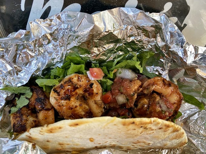 These grilled shrimp tacos aren't just food &ndash; they're edible postcards from seafood heaven, complete with fresh pico and crisp greens.
