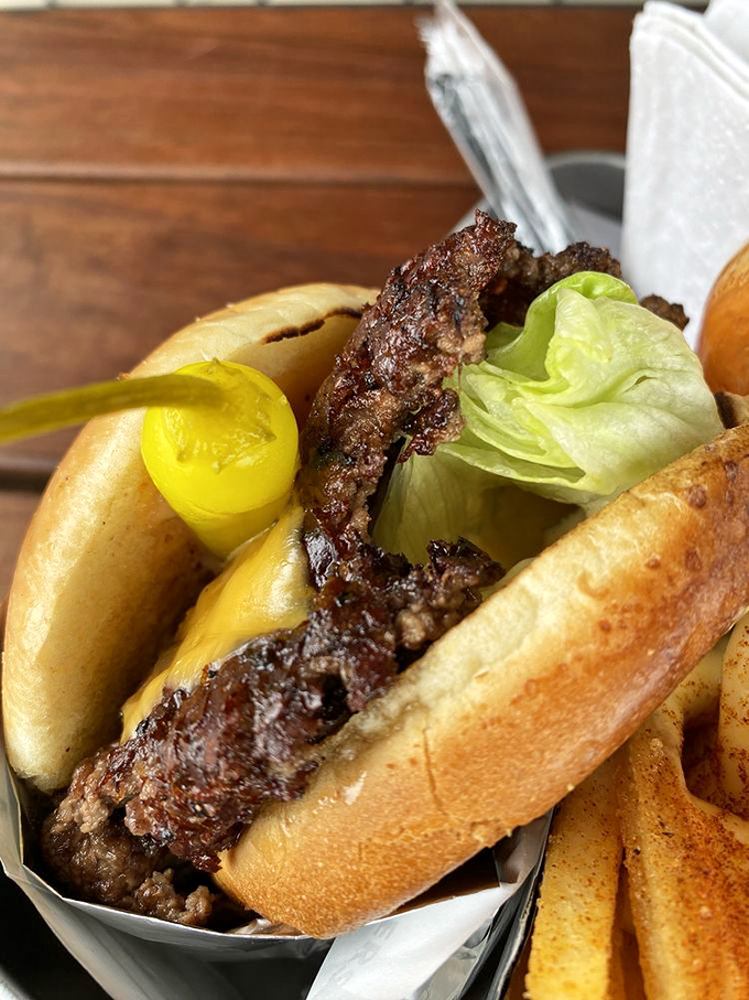 Behold the smash burger in its natural glory&mdash;crispy-edged patty, melty cheese, and a brioche bun that somehow manages to contain all that magnificence.