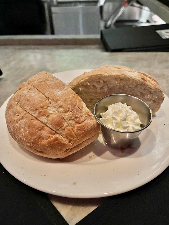 Bread that makes you question your carb-avoiding life choices. Warm, crusty sourdough with whipped butter&mdash;civilization's greatest achievement.
