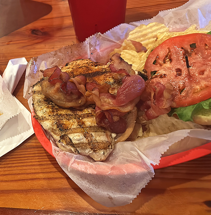 Not just another chicken sandwich! This beauty, with its perfectly grilled chicken and crispy bacon, proves the Brass Ring isn't just a one-trick pony. 