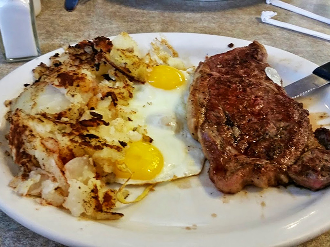 This isn't just breakfast, it's edible poetry&mdash;a perfectly seared steak alongside eggs that would make a chicken proud of its contribution.