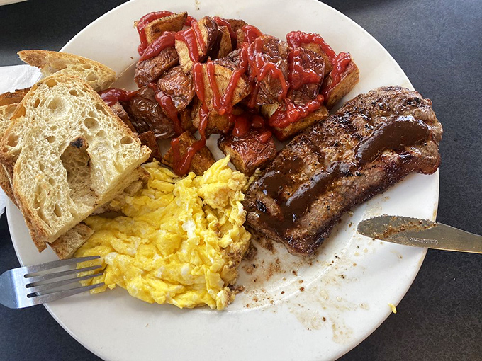 Breakfast of champions? More like breakfast of people who plan to champion a nap afterward. Those home fries look like they've achieved the perfect crisp-to-tender ratio.