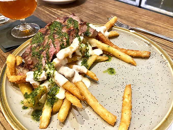The star of the show: steak frites that would make a Parisian weep with joy. That chimichurri sauce isn't just green&mdash;it's money.