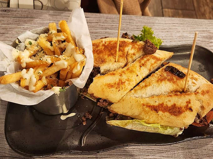 This steak sandwich isn't just a meal, it's an event &ndash; complete with perfectly seasoned fries that deserve their own spotlight.