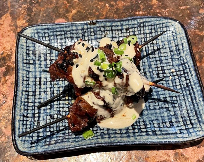 These skewers aren't just steak&mdash;they're meat transformed into art, drizzled with sauce that makes your taste buds do a standing ovation.