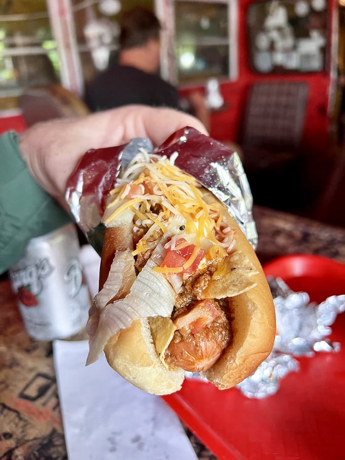 This isn't just a hot dog&mdash;it's a masterpiece wrapped in foil. The cheese-to-chili ratio would make a mathematician weep with joy.