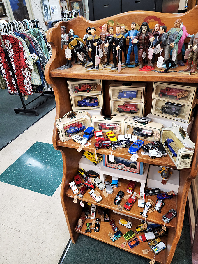 Star Trek figurines stand guard over vintage toy cars&mdash;proof that childhood nostalgia comes in all scales and galaxies.