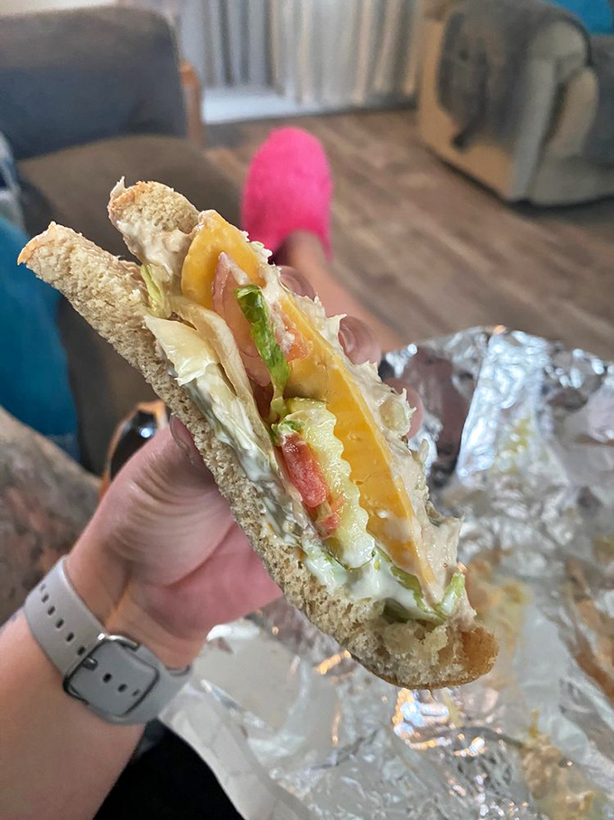 This isn't just a tuna sandwich; it's edible architecture with layers of fresh ingredients that puts sad desk lunches to shame.