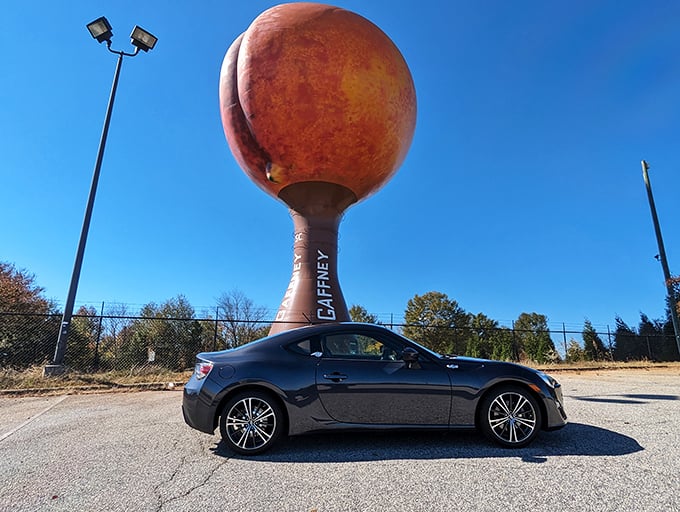 Another day, another sports car posing with the Peachoid. It's like a bizarre automotive mating ritual that happens daily in Gaffney.